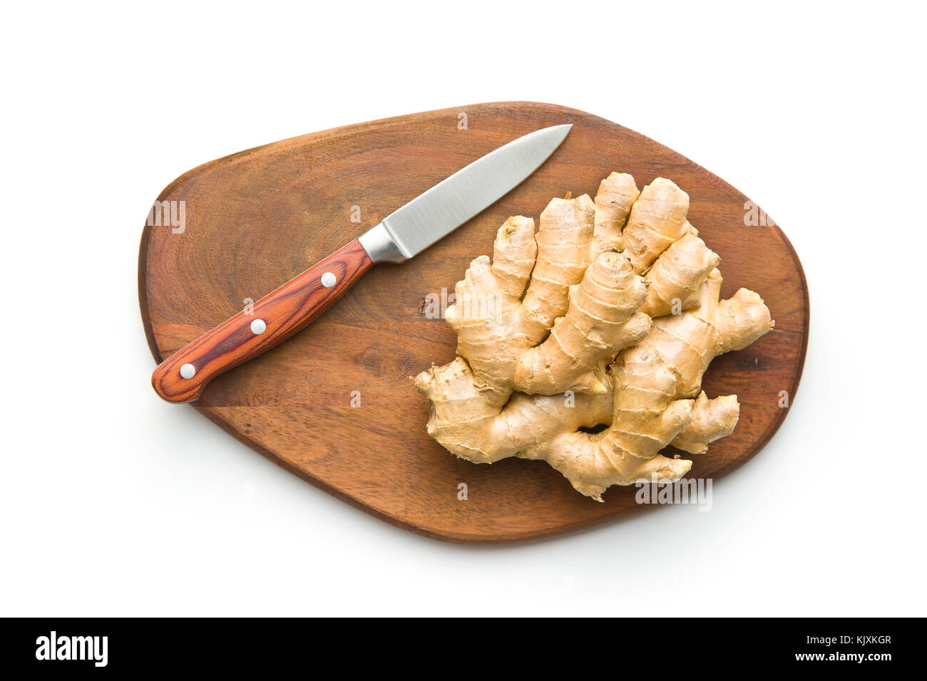 Healthy ginger root on cutting board and knife. Isolated on white ...