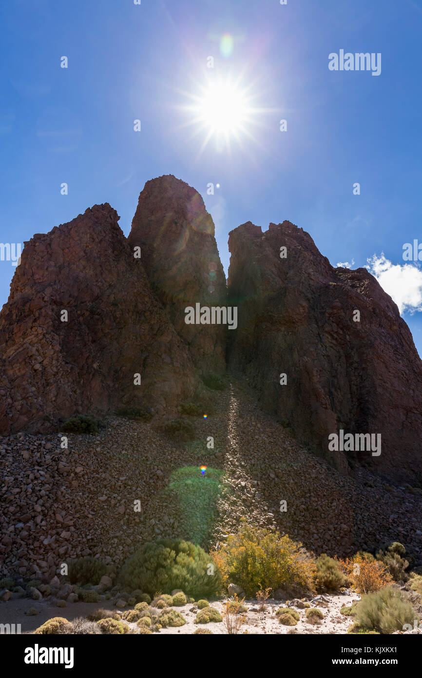 Sun flare over a volcanic rock formation in the national park of Las ...