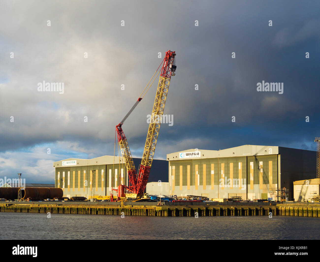 Large mobile crane on the quayside at Wilton Group fabrication yard ...