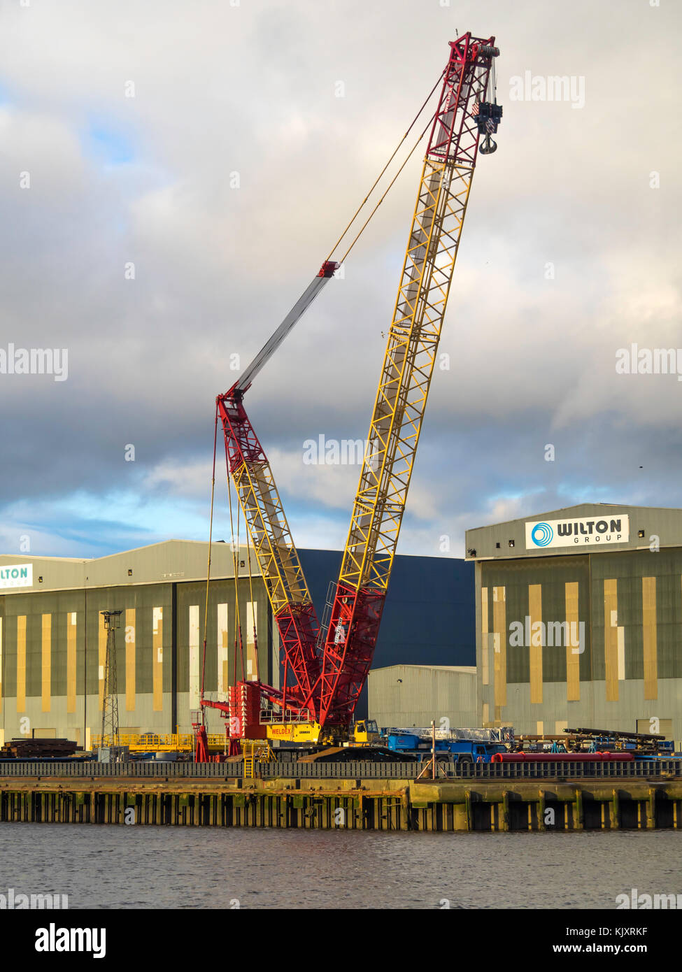 Large mobile crane on the quayside at Wilton Group fabrication yard ...