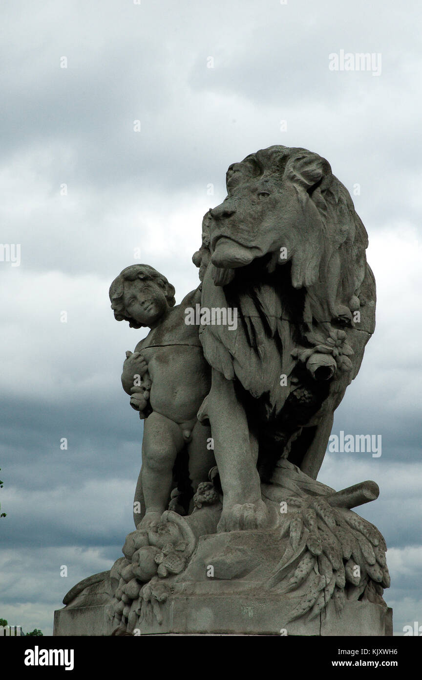 Stone Statue of a child cherub standing by lion on the 19th century ...
