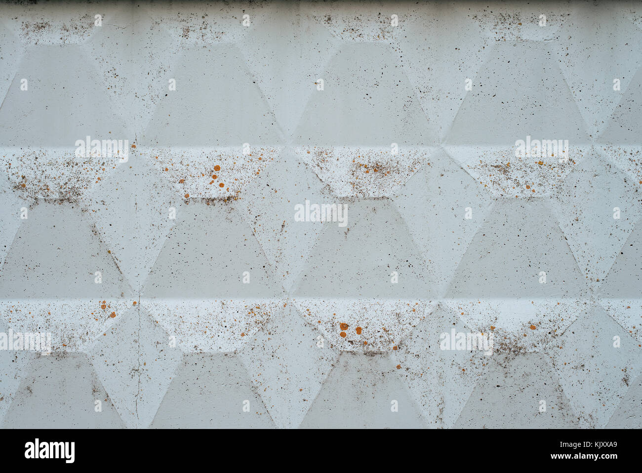 Concrete fence, old wall covered with mud from the rain, autumn ...