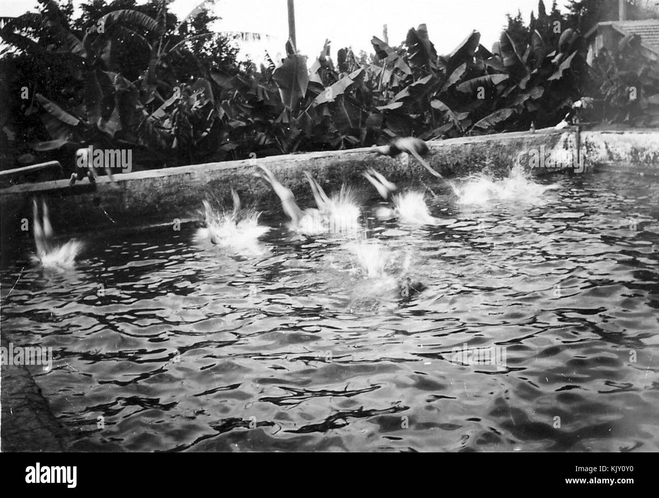 The image captures Gan Samuel, a notable figure in early 20th-century ...