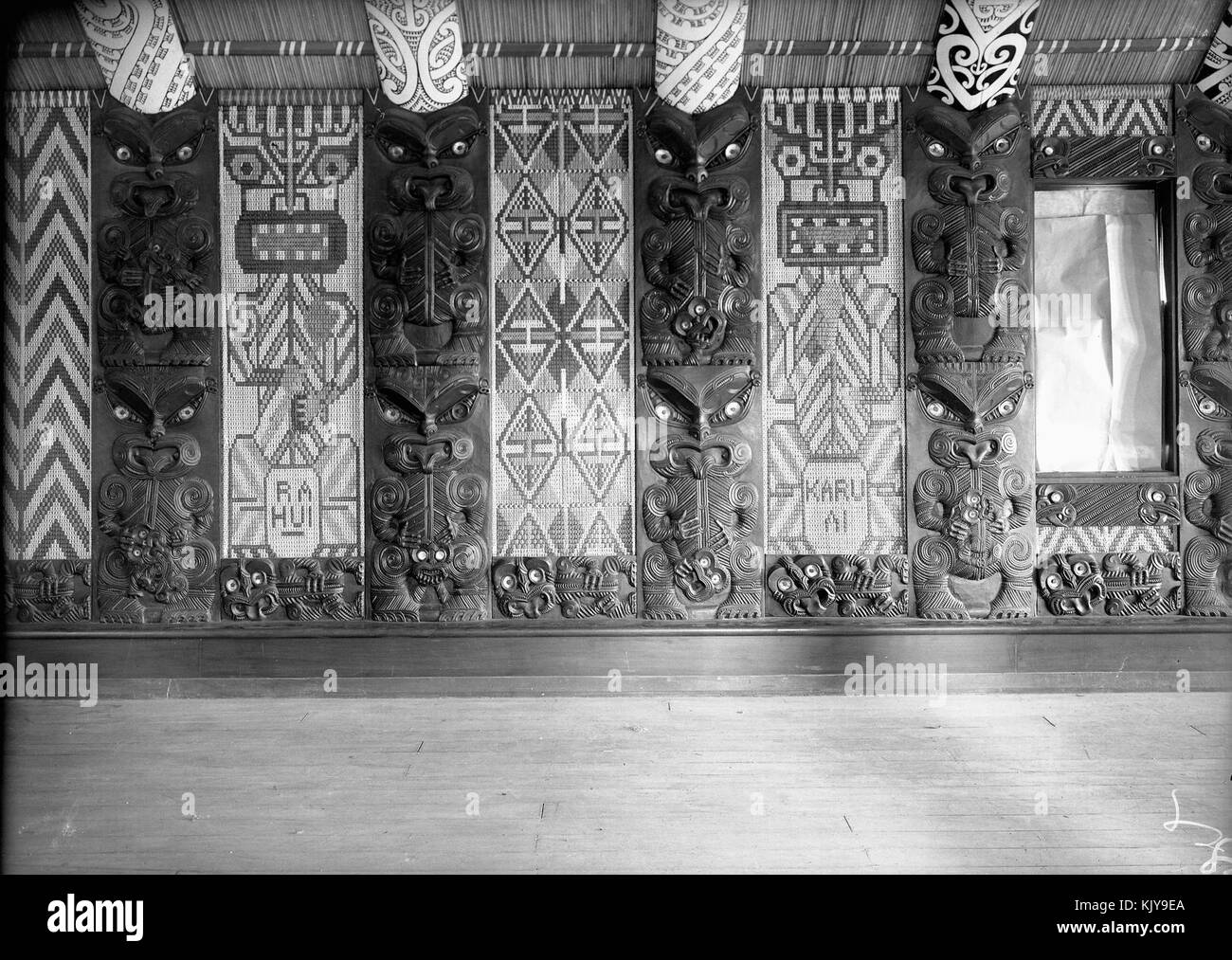 Tukutuku and carved wooden panels, inside Porourangi meeting house at ...