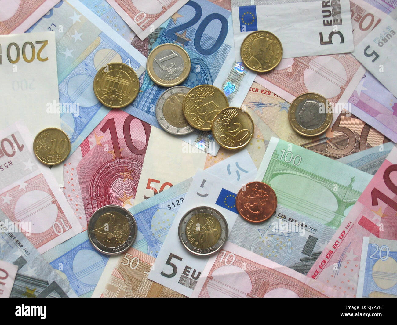 Euro coins and banknotes Stock Photo - Alamy