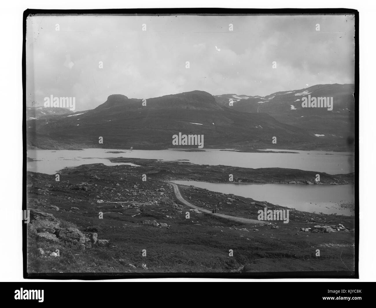 This scenic view from the Norwegian fjeld (mountain range) shows the ...