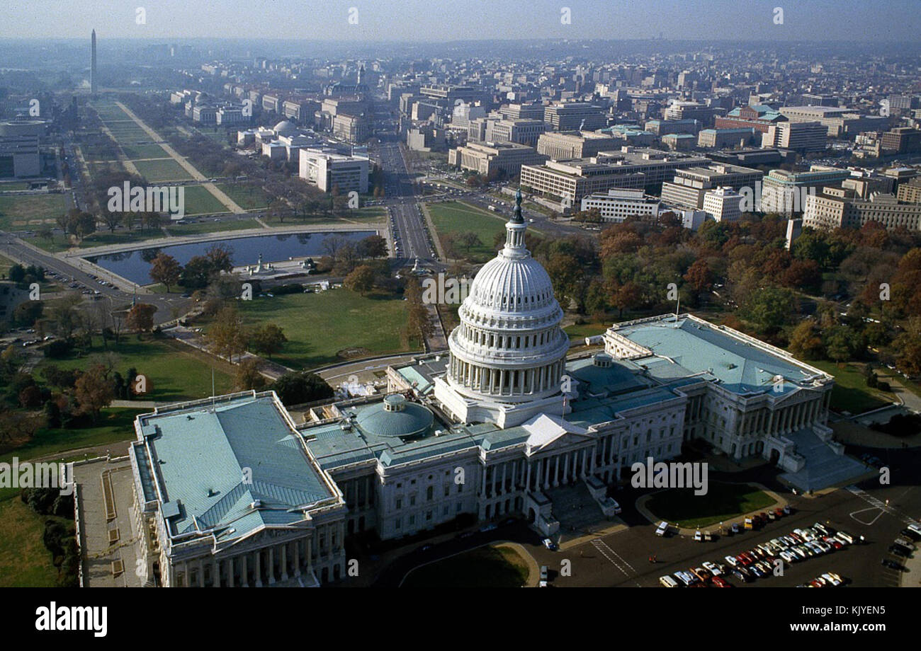 Aerial view of the U.S. Capitol in the foreground toward National Mall ...