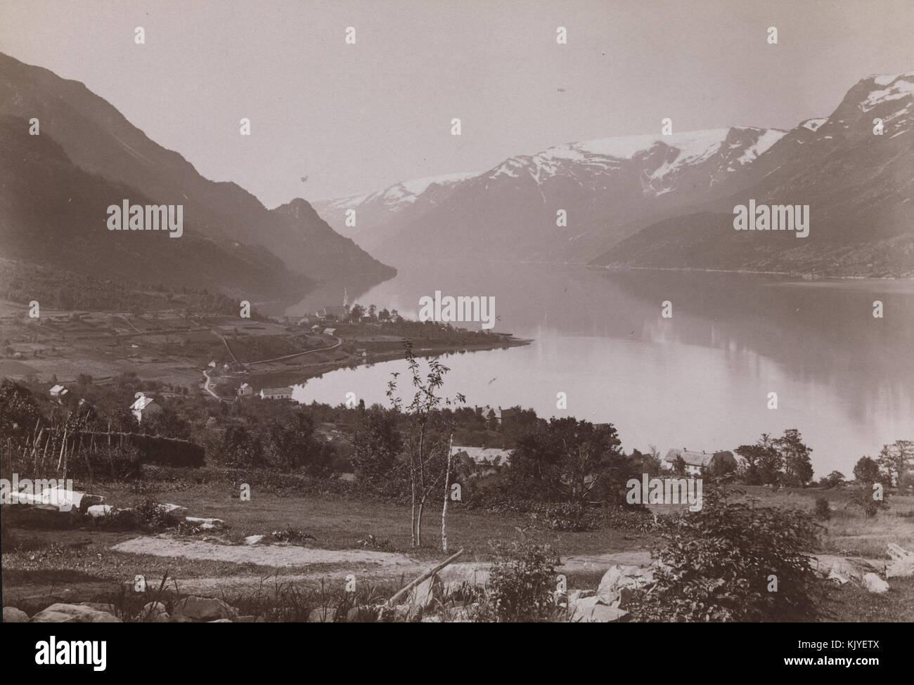 This historic photograph captures a scenic view of Ullensvang and ...