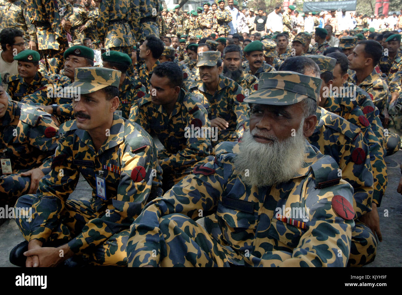 DHAKA, BANGLADESH – MARCH 01, 2009: Bangladeshi border guards sit at ...