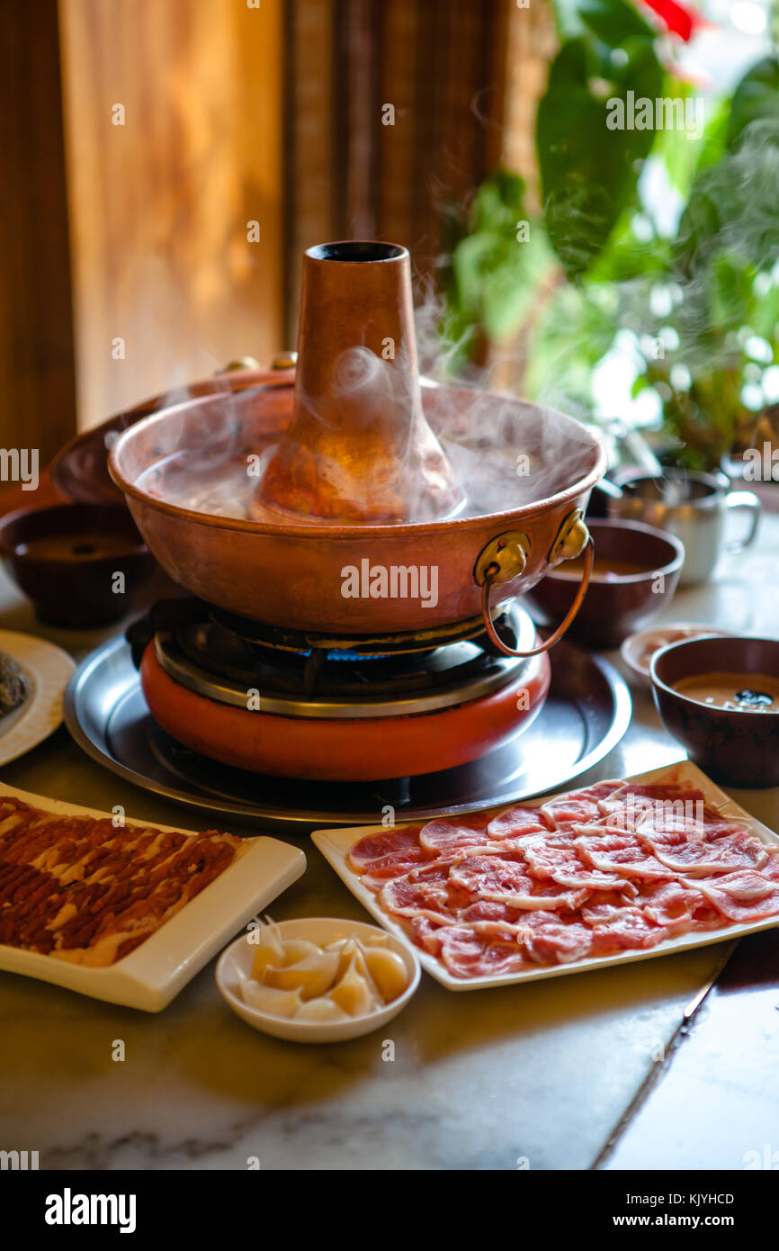 Beijing, China famous cuisine boiled mutton, the sliced lamb slices in ...