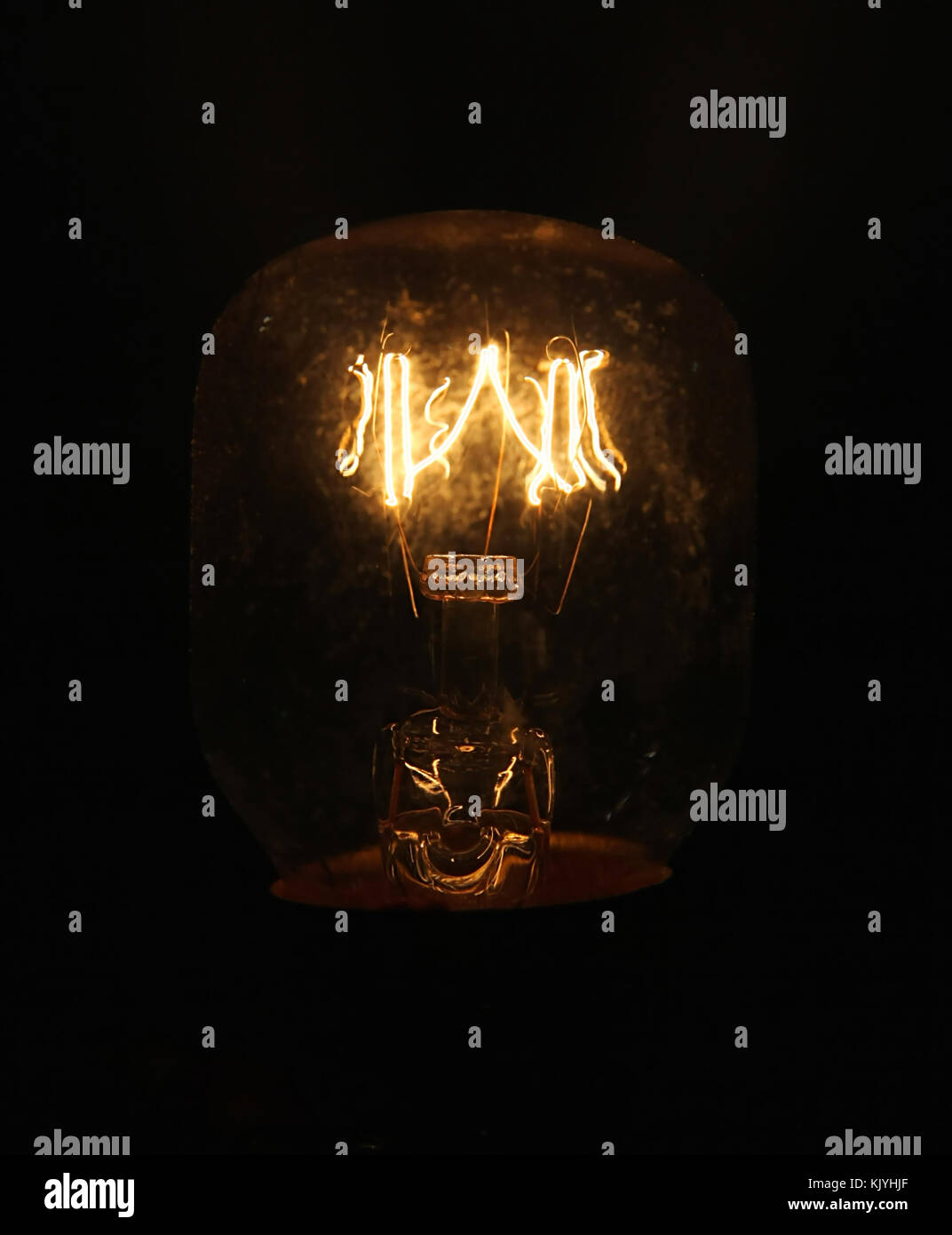 Incandescent light bulb filament hi-res stock photography and images ...