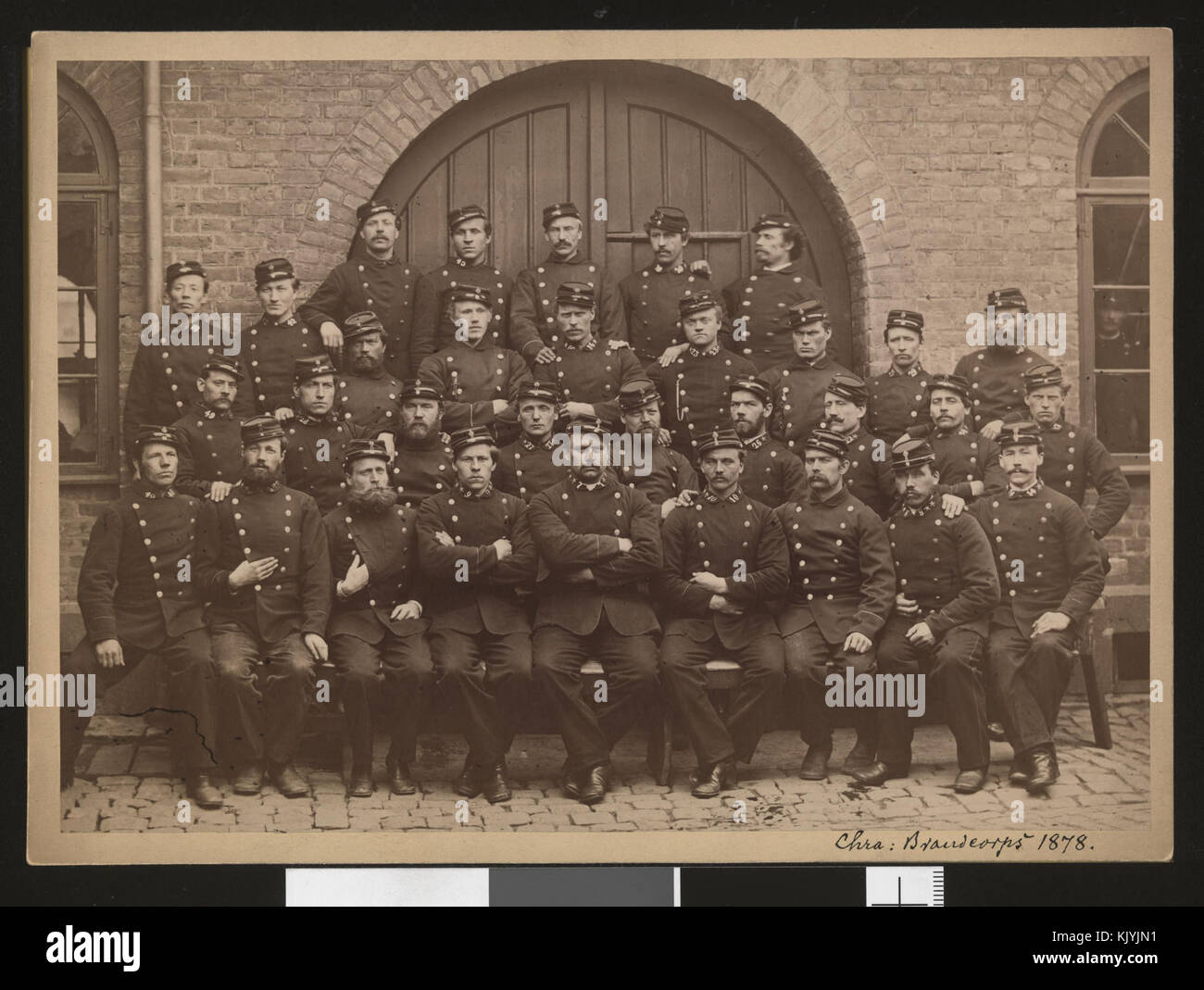 This historical photograph shows members of the Christiania Fire Corps ...
