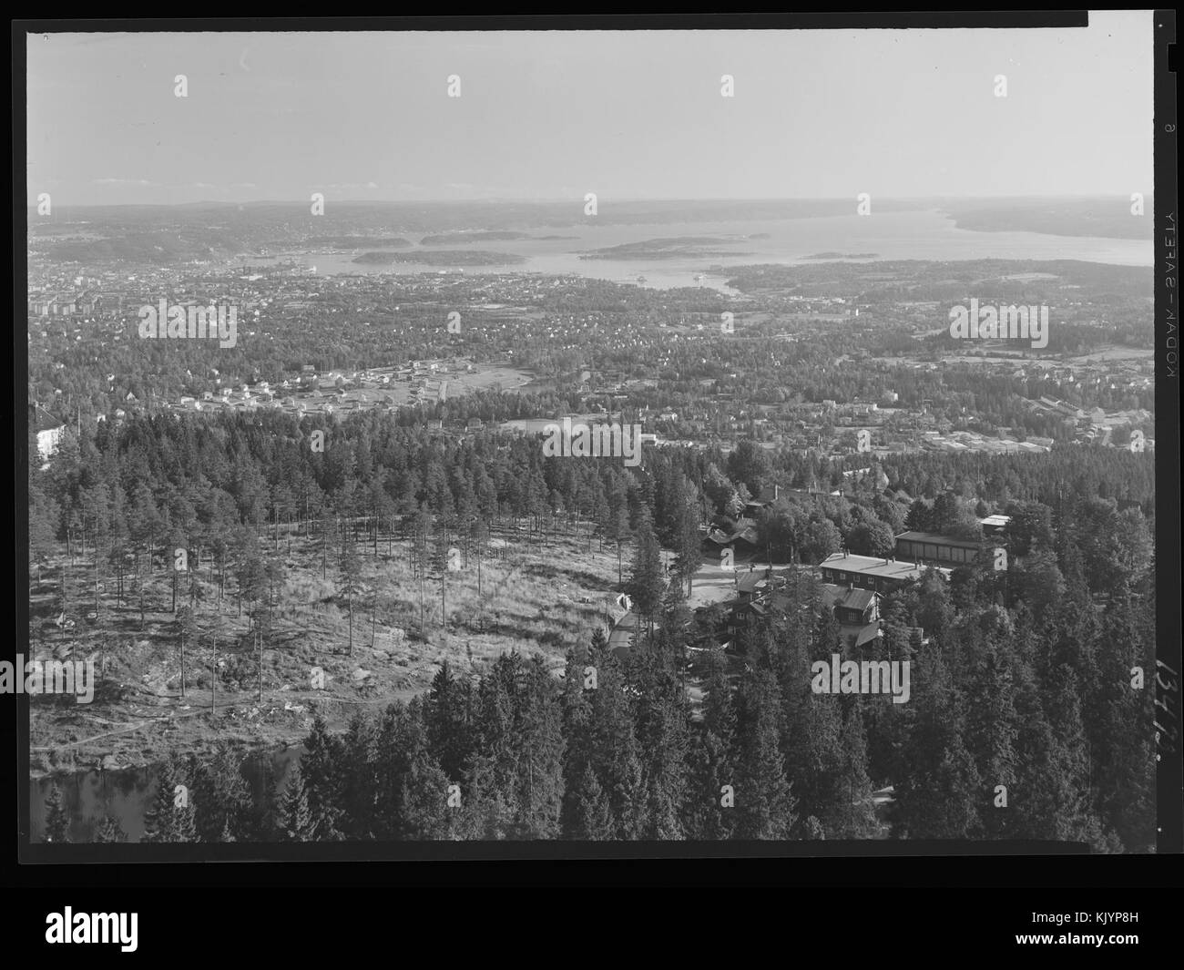 This image captures a scenic view from Holmenkollen, a popular tourist ...