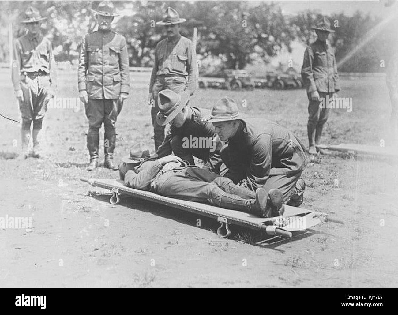 This image documents a first aid training session at Camp Crane in 1918 ...