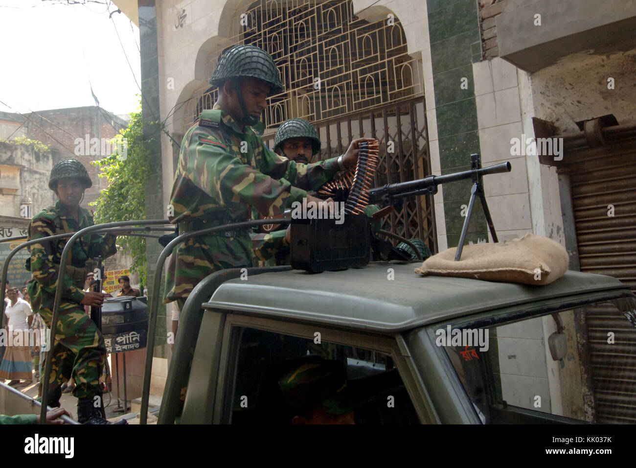 DHAKA, BANGLADESH- FEBRUARY 25, 2009: Bangladesh Army solders stand on ...