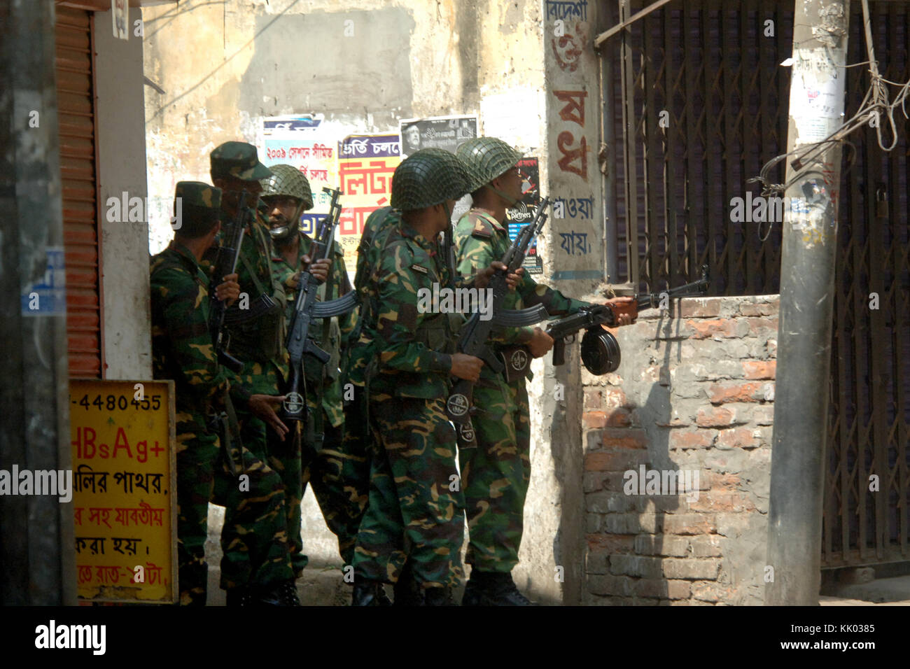 DHAKA, BANGLADESH- FEBRUARY 25, 2009: Bangladesh Army solders stand on ...