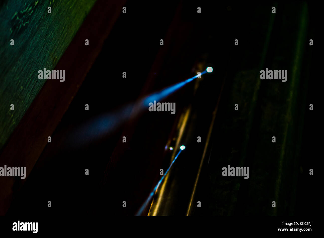 light through the crack of blue ray of light Stock Photo - Alamy
