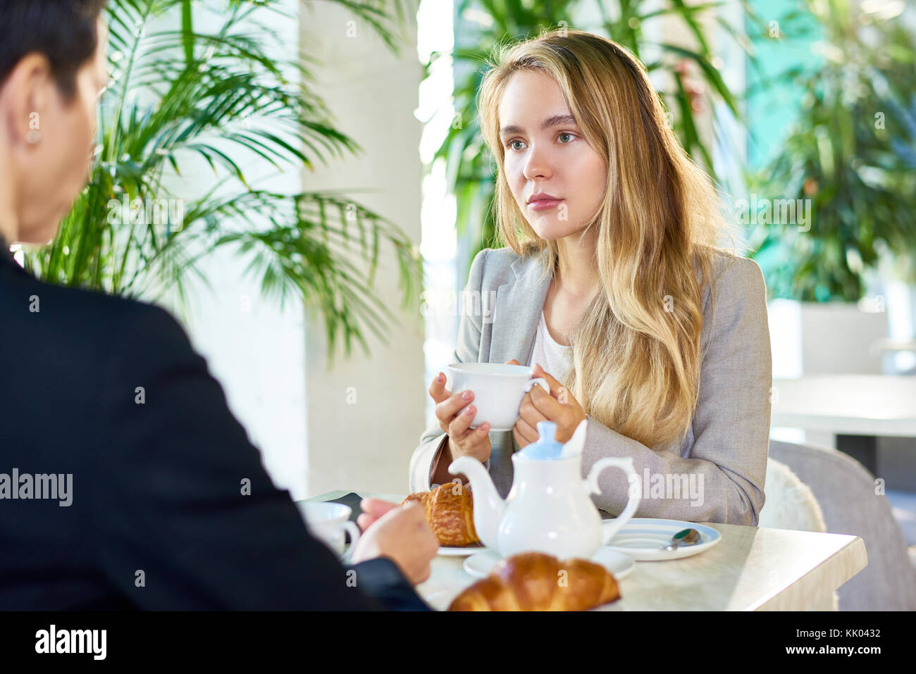 From across table hi-res stock photography and images - Alamy