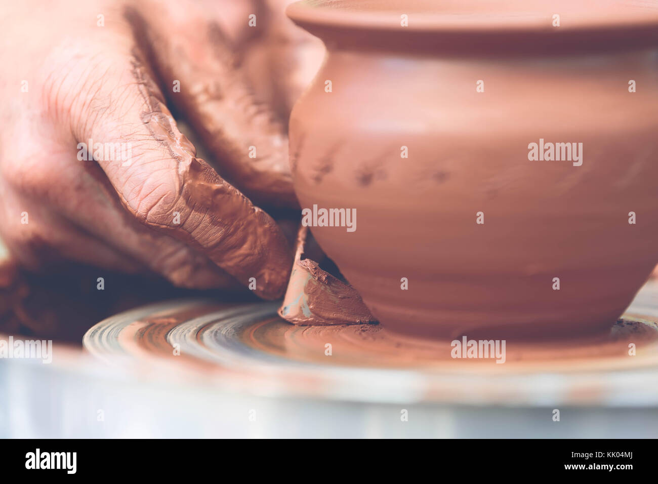 Hands of a potter. Potter making ceramic pot on the pottery wheel Stock ...