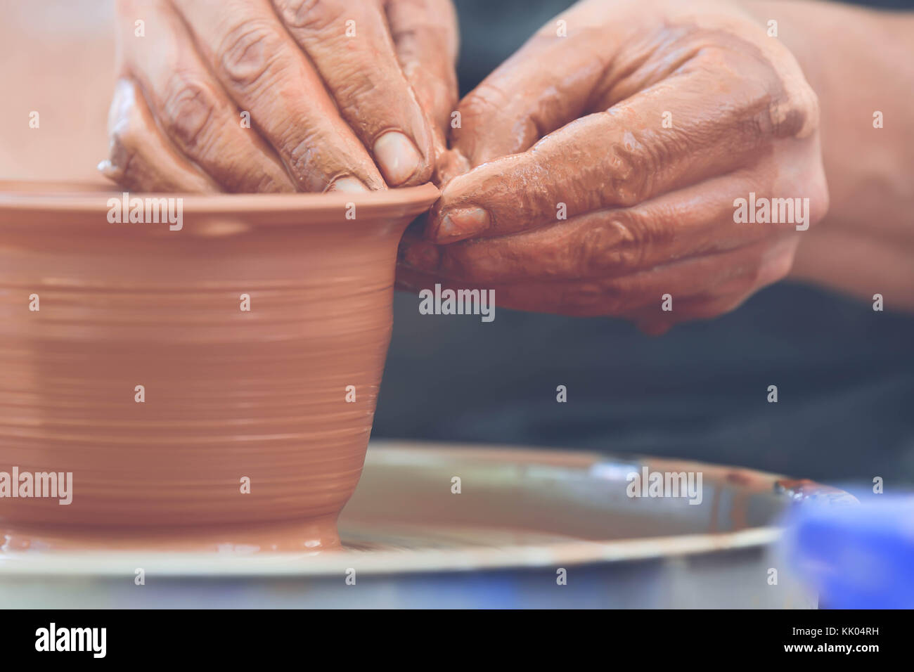 Hands of a potter. Potter making ceramic pot on the pottery wheel Stock ...