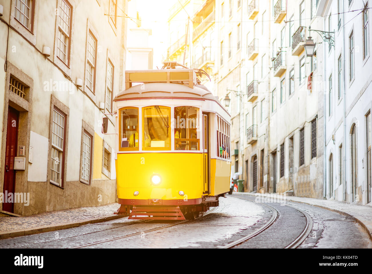 Street view with famous old tourist tram during the sunny day in Lisbon ...