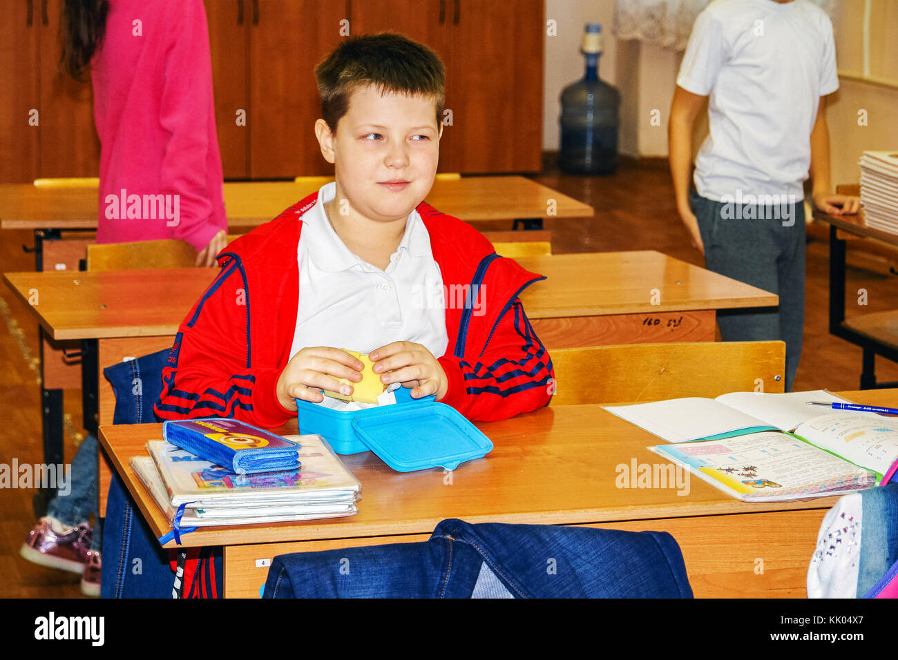 Schoolboy in class at a Desk Stock Photo - Alamy