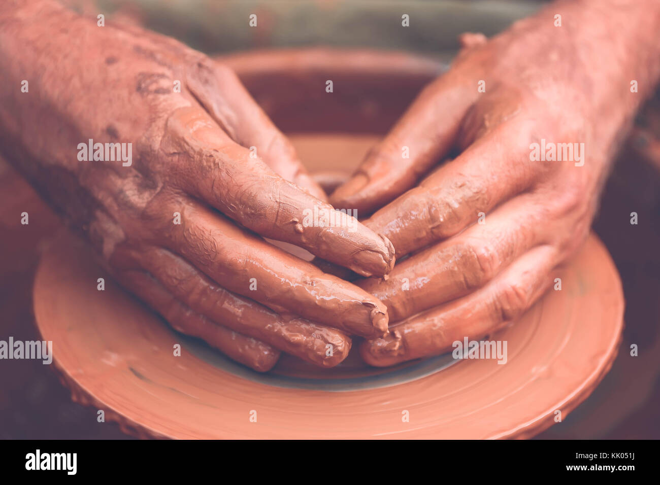 Hands of a potter. Potter making ceramic pot on the pottery wheel Stock ...