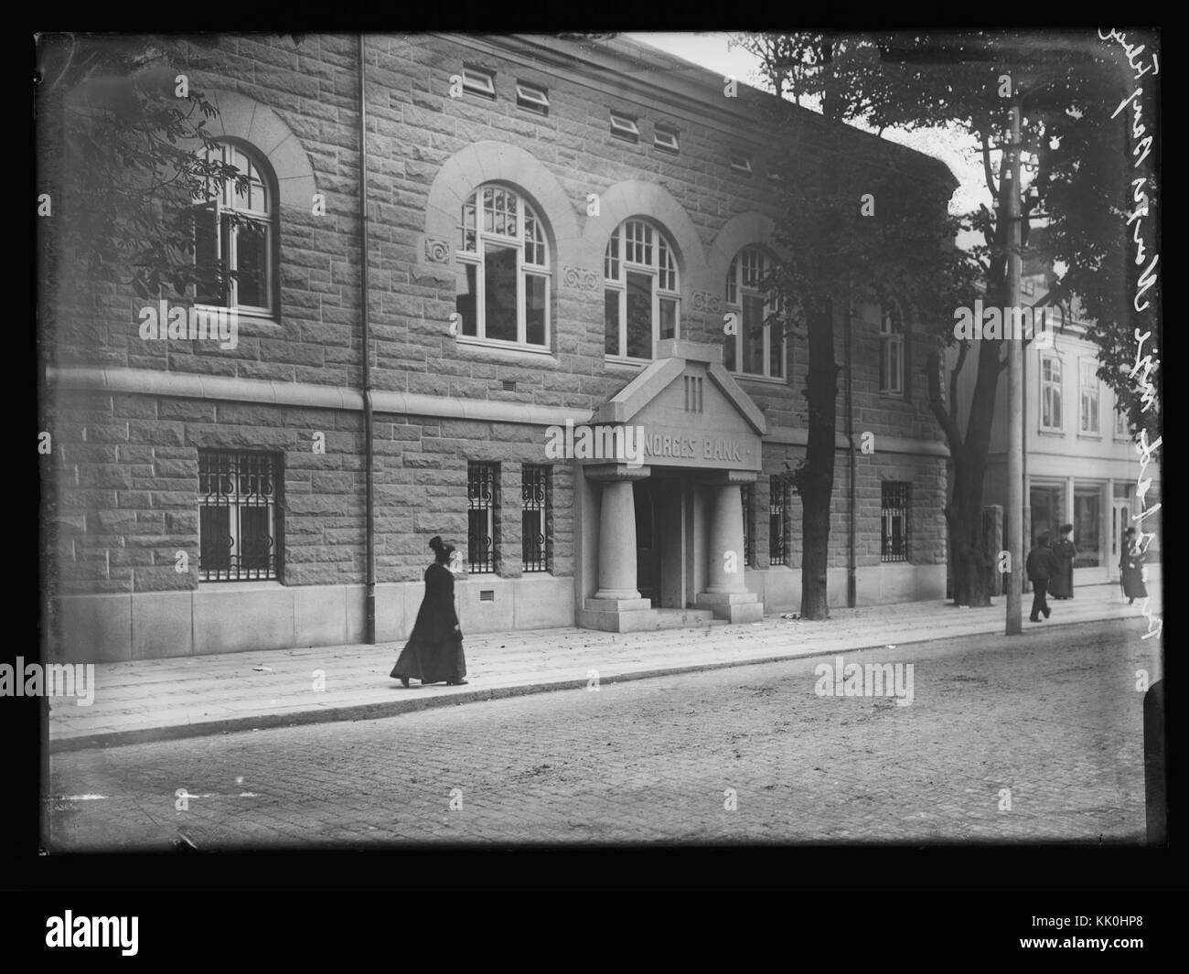 This image features the facade of Norges Bank in Fr. Stad, Norway ...