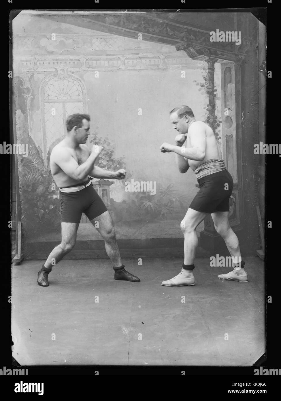 The image shows boxing in an ancient setting, illustrating the sport's ...