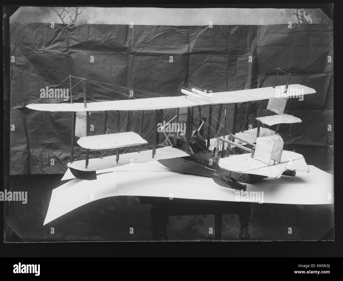 A collection of vintage photos and model airplanes from the 20th ...