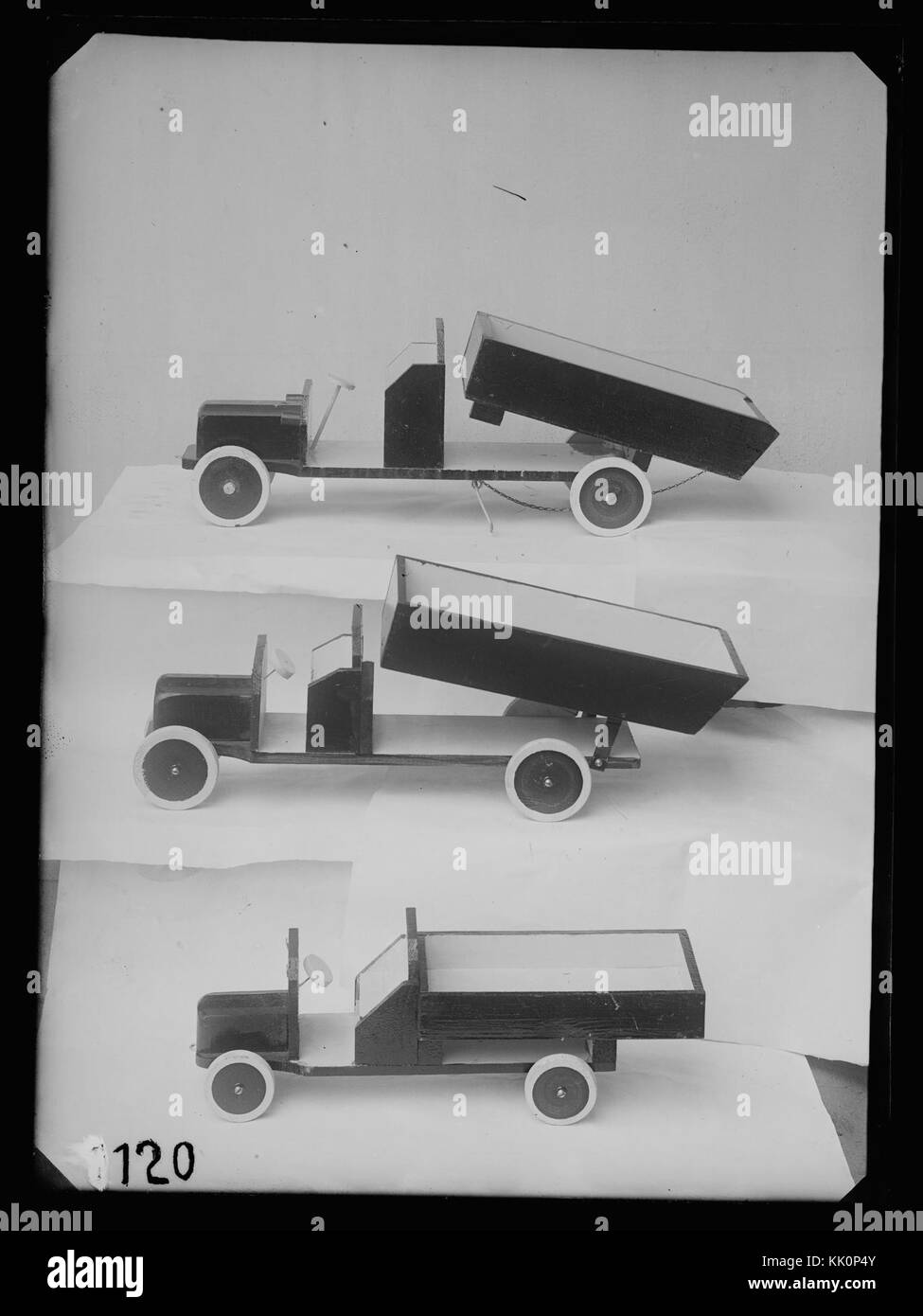 This photograph likely captures historical or vintage vehicles ...