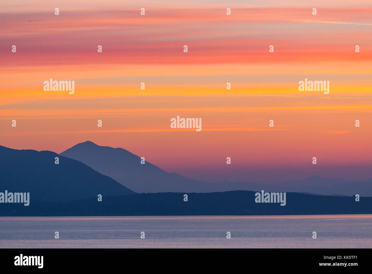 Beautiful sunset on Greece coast Stock Photo - Alamy