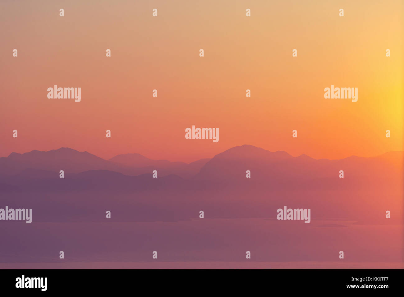 Beautiful sunset on Greece coast Stock Photo - Alamy