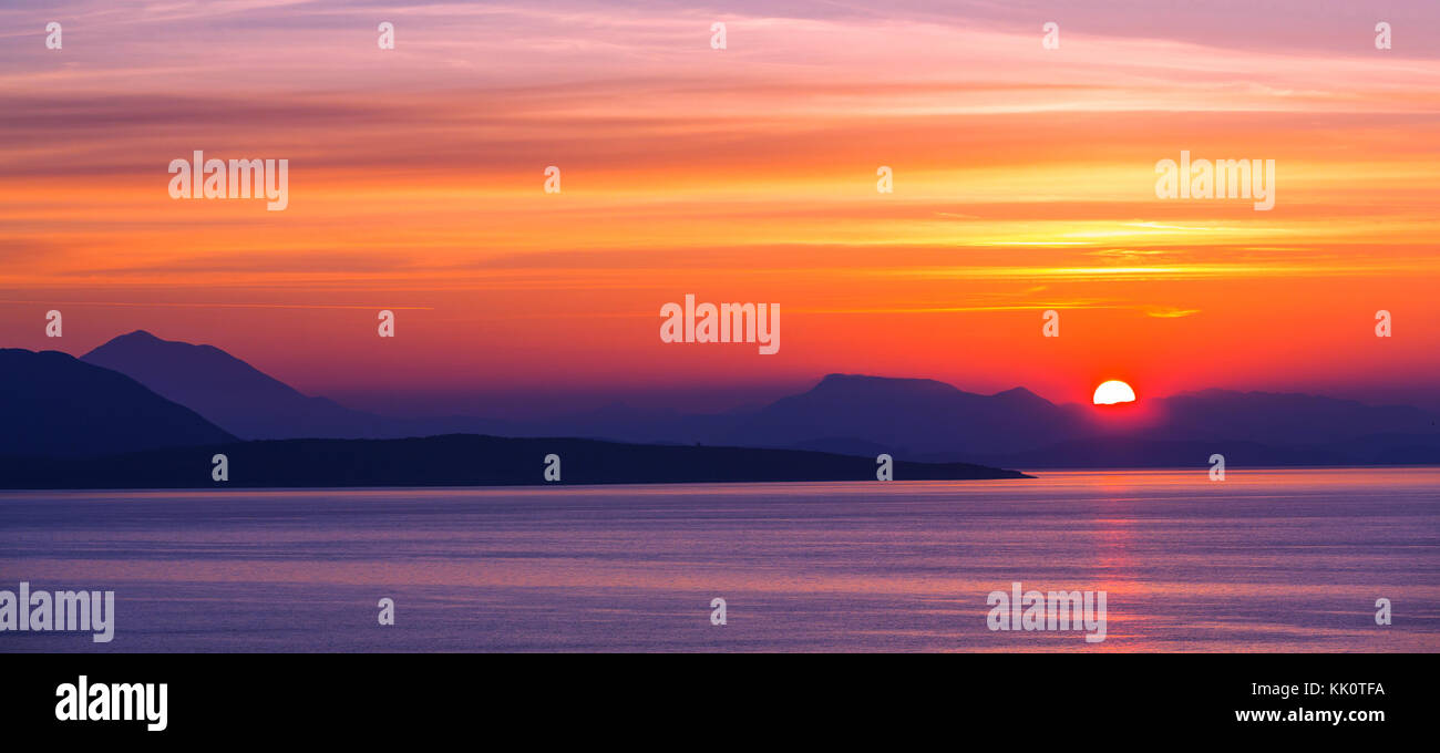 Beautiful sunset on Greece coast Stock Photo - Alamy
