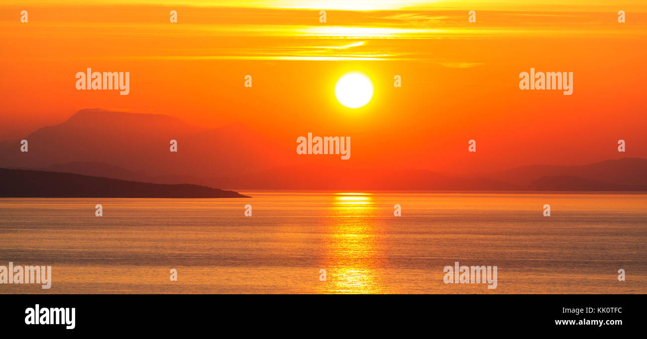 Beautiful sunset on Greece coast Stock Photo - Alamy