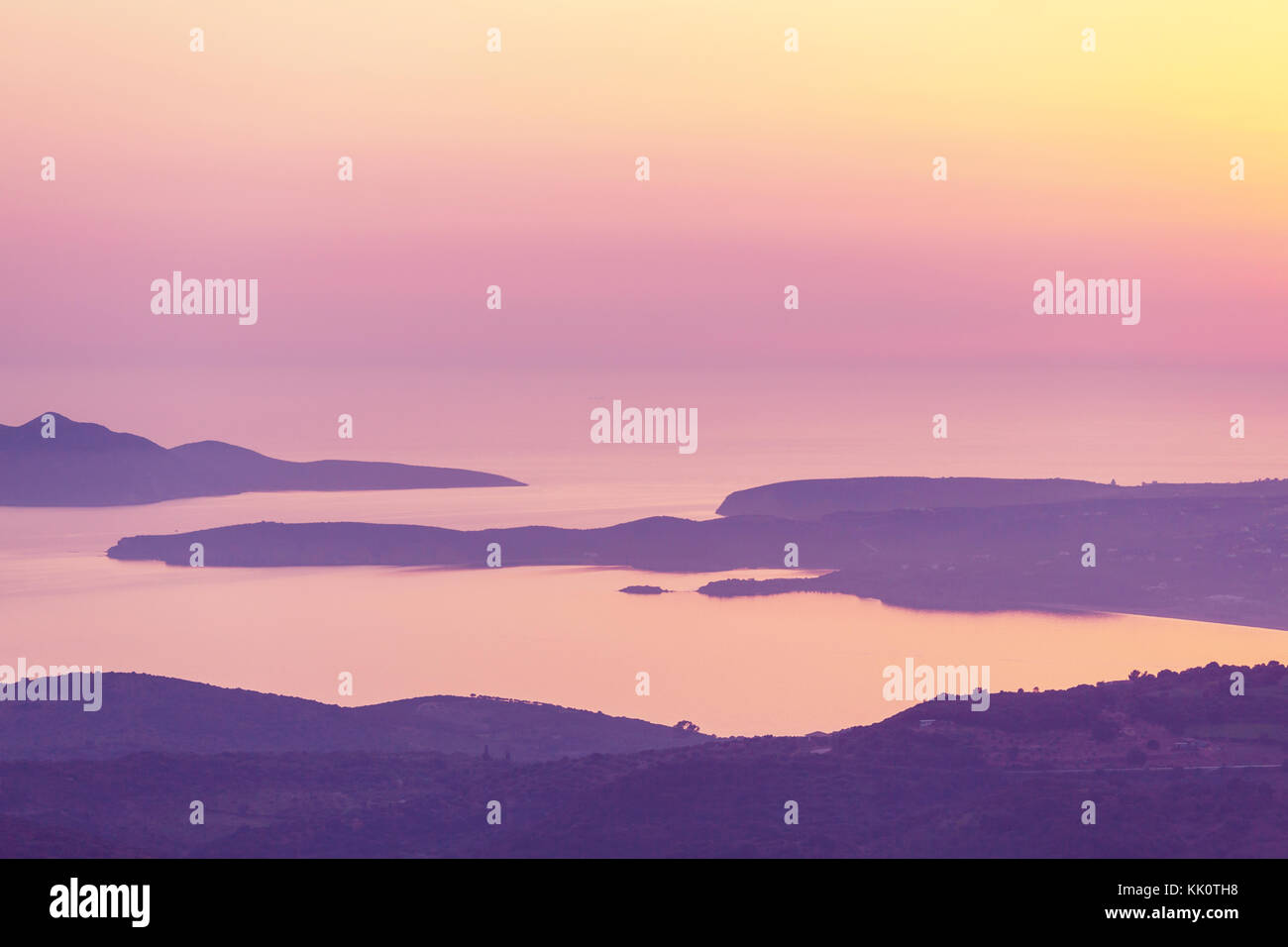 Beautiful sunset on Greek coast Stock Photo - Alamy