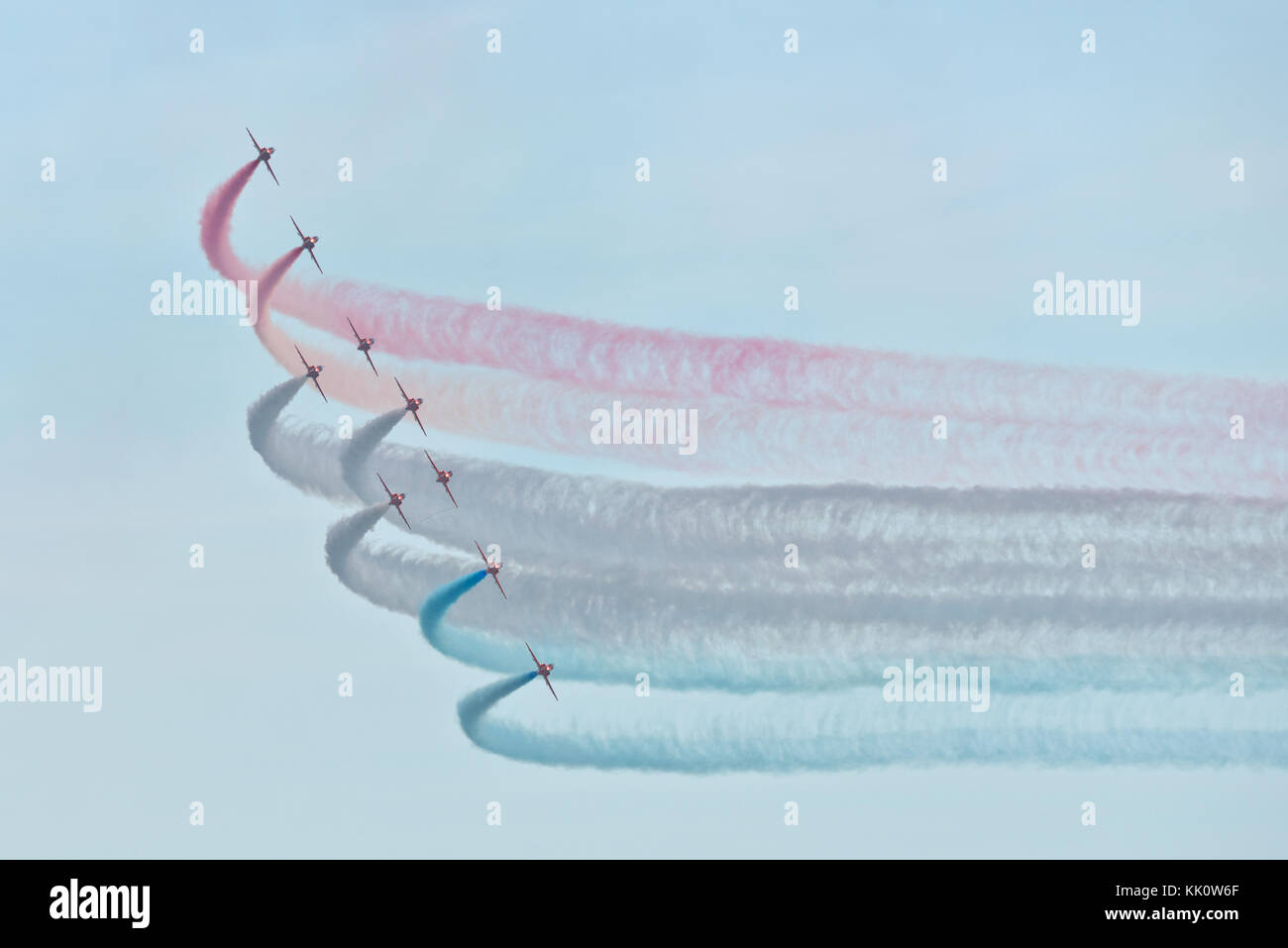 The RAFs Red Arrows performing the "nine arrow to phoenix" as part of ...