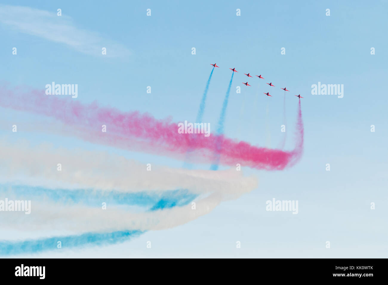The RAFs Red Arrows performing the "nine arrow to phoenix" as part of ...