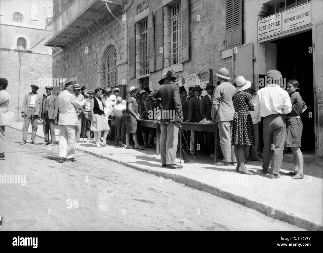 Lines of Jews at the Jerusalem G.P.O. Standing in queues waiting to ...