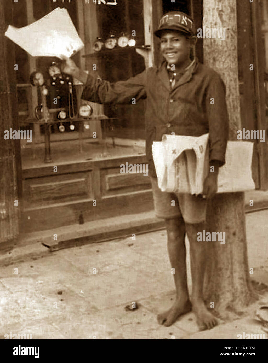 Boy selling Doar Hayom newspaper, Jerusalem 1920s Stock Photo - Alamy