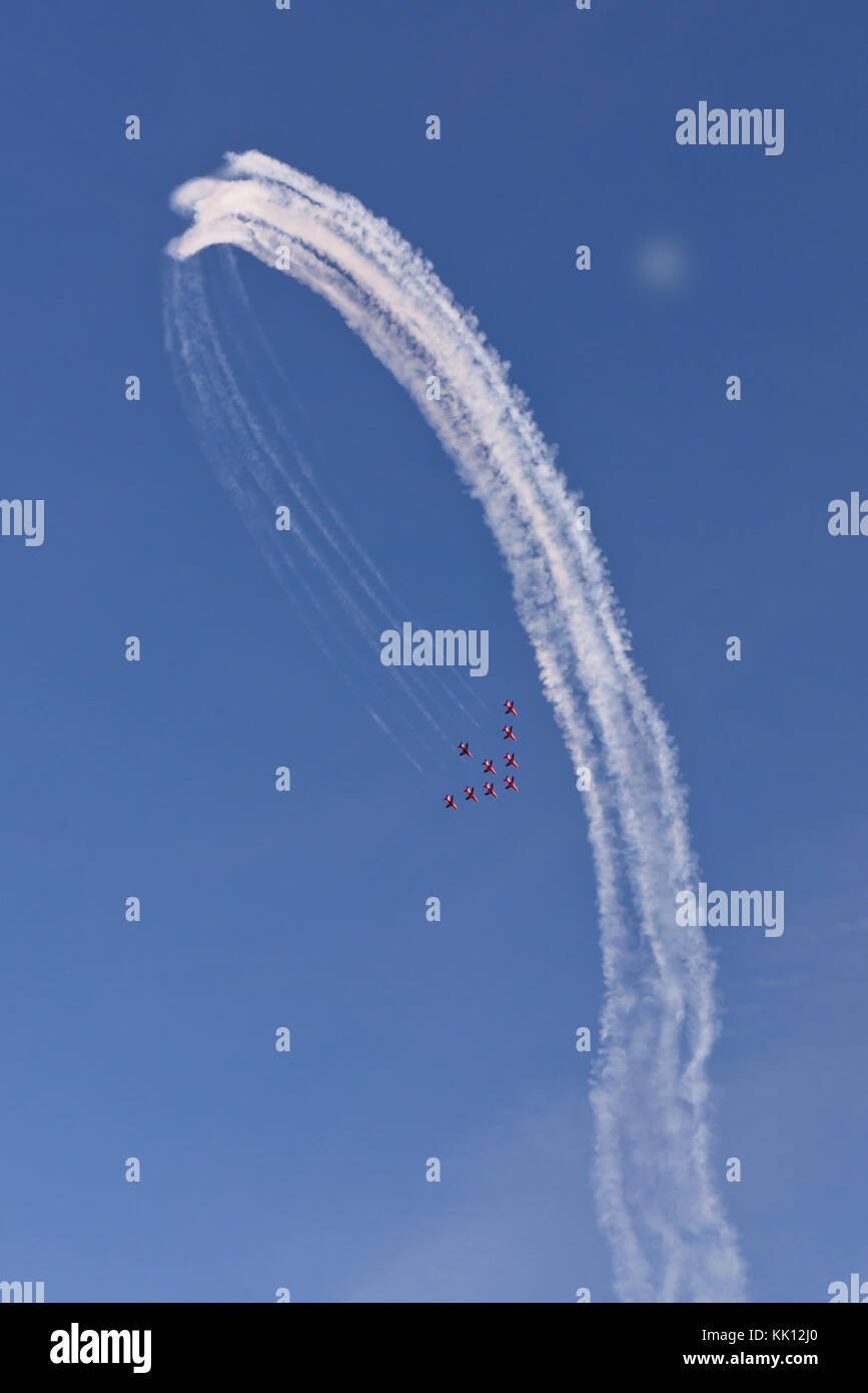 The RAFs Red Arrows performing the "nine arrow to phoenix" manoeuvre as ...
