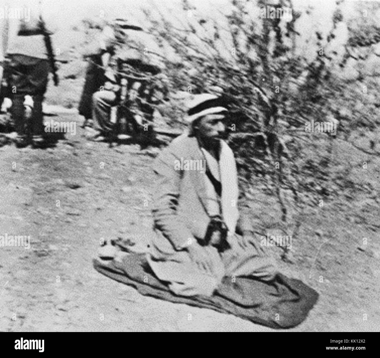 Abd al Rahim praying during revolt Stock Photo - Alamy