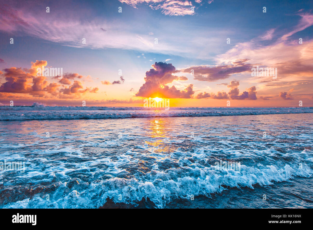 Splashing ocean wave in front of beautiful sunset sky background Stock ... Splashing ocean wave in front of beautiful sunset sky background Stock ...