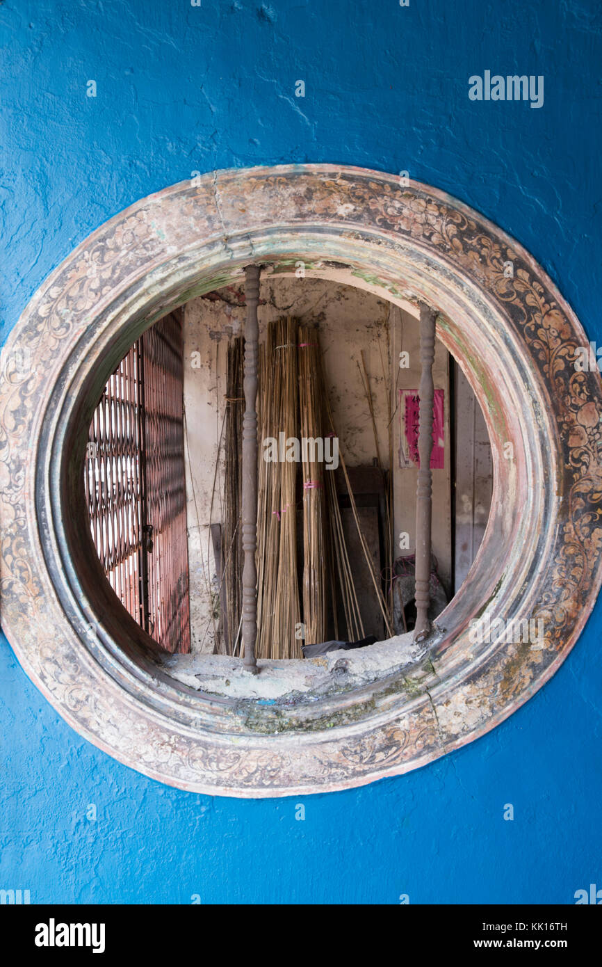 Round window in Malacca Stock Photo - Alamy