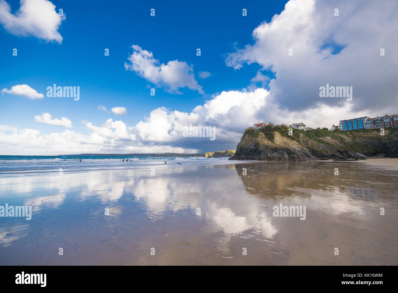 A view of Tolcarne Beach in Newquay,Cornwall, UK. Surfers in the ...