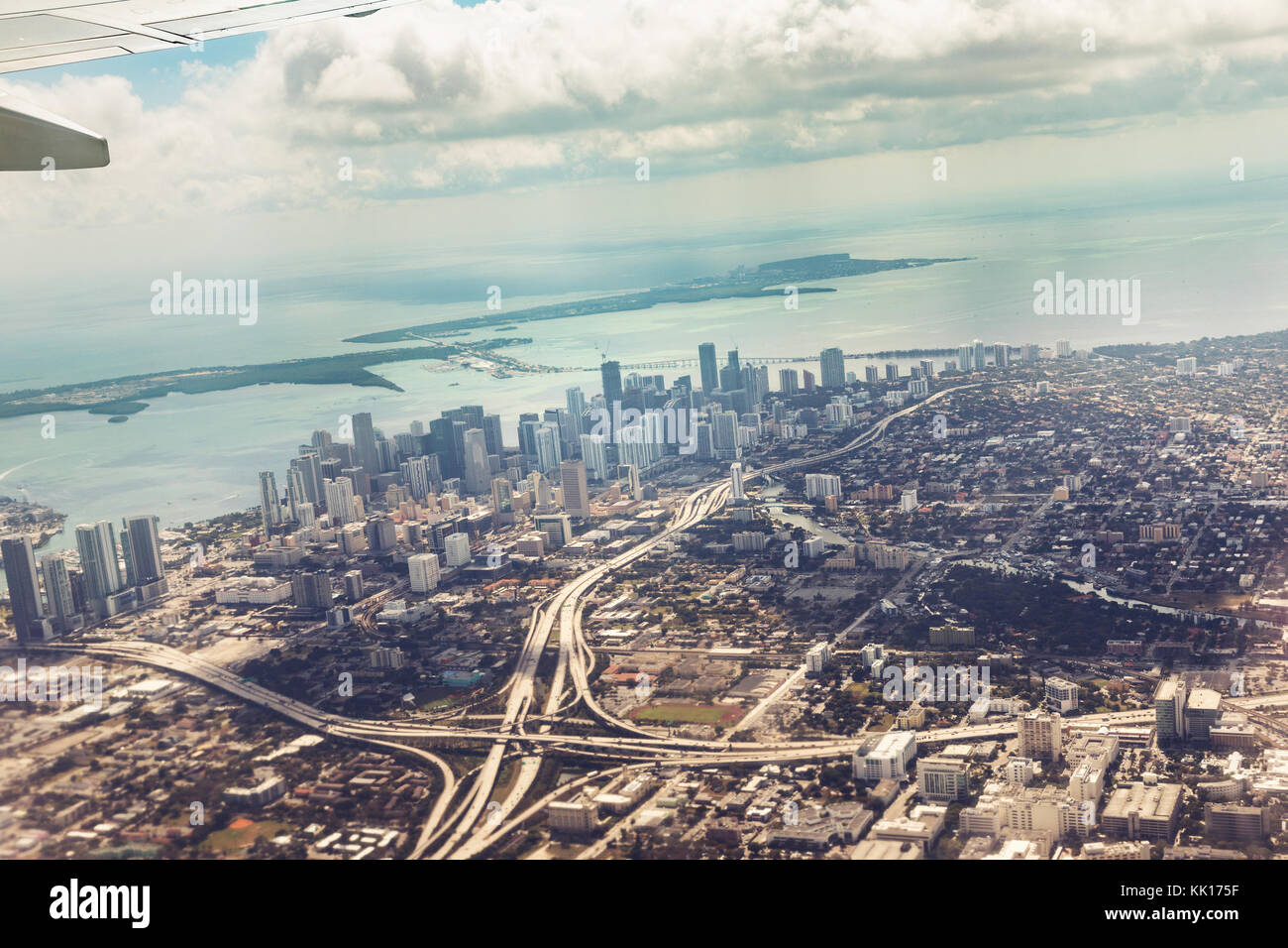 Aerial view of Miami from the aircraft. In the background of ...