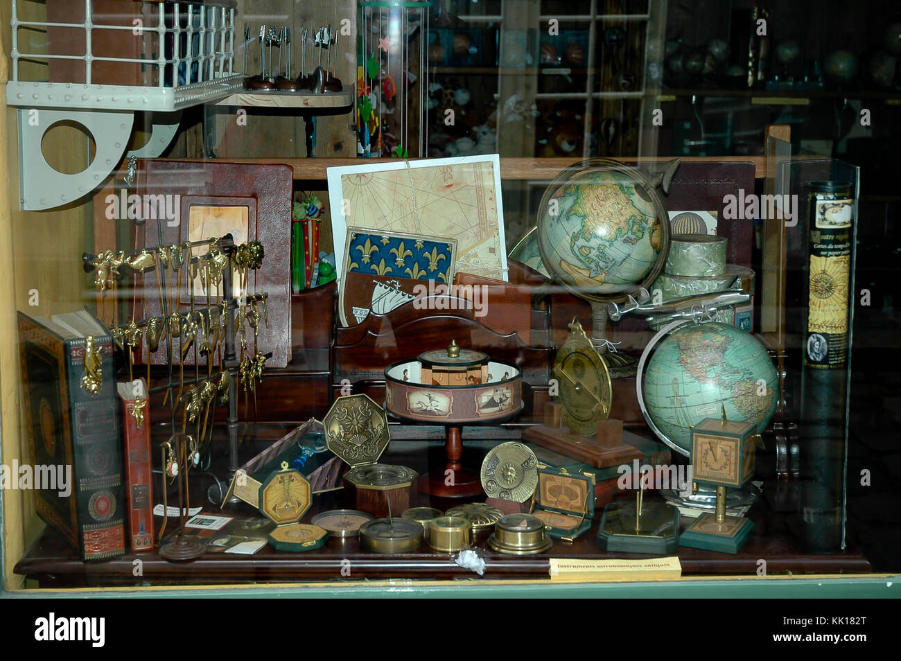 Antique store window display selling antique astronomical instruments ...