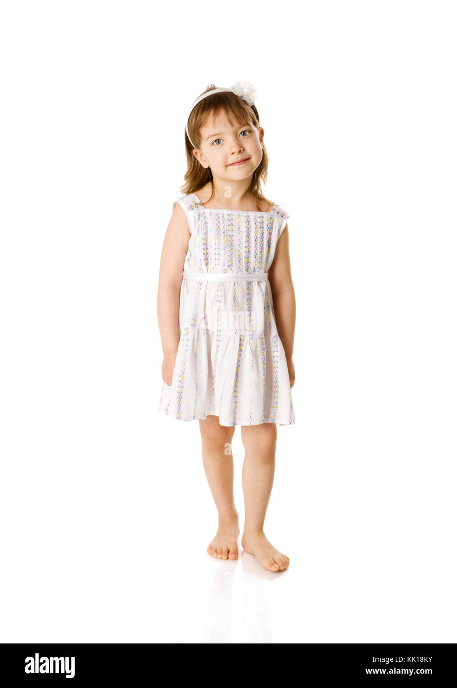 Happy Little girl standing isolated on white Stock Photo - Alamy