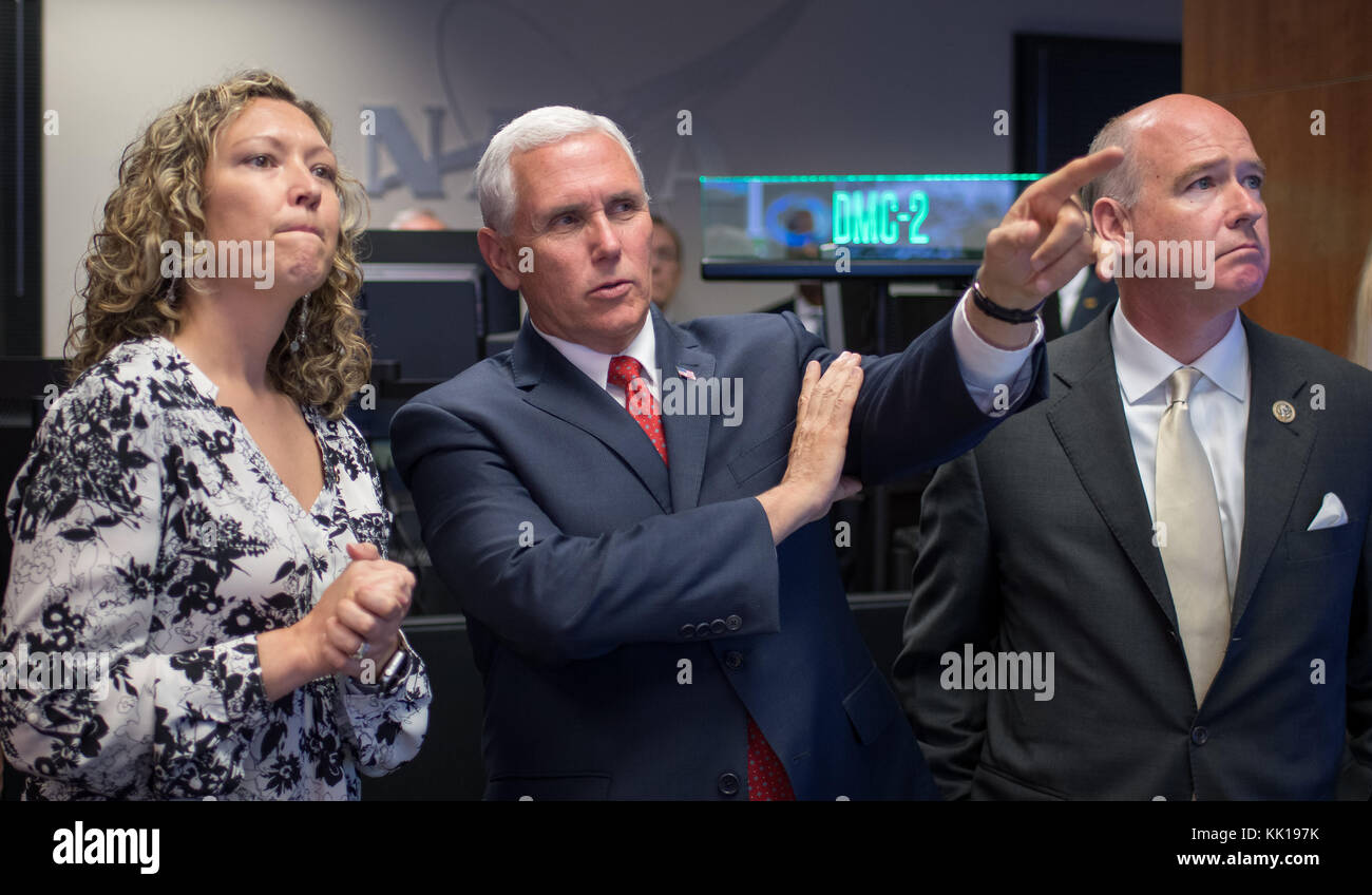 NASA Payload Operations Director Stephanie Dudley (left) gives U.S ...