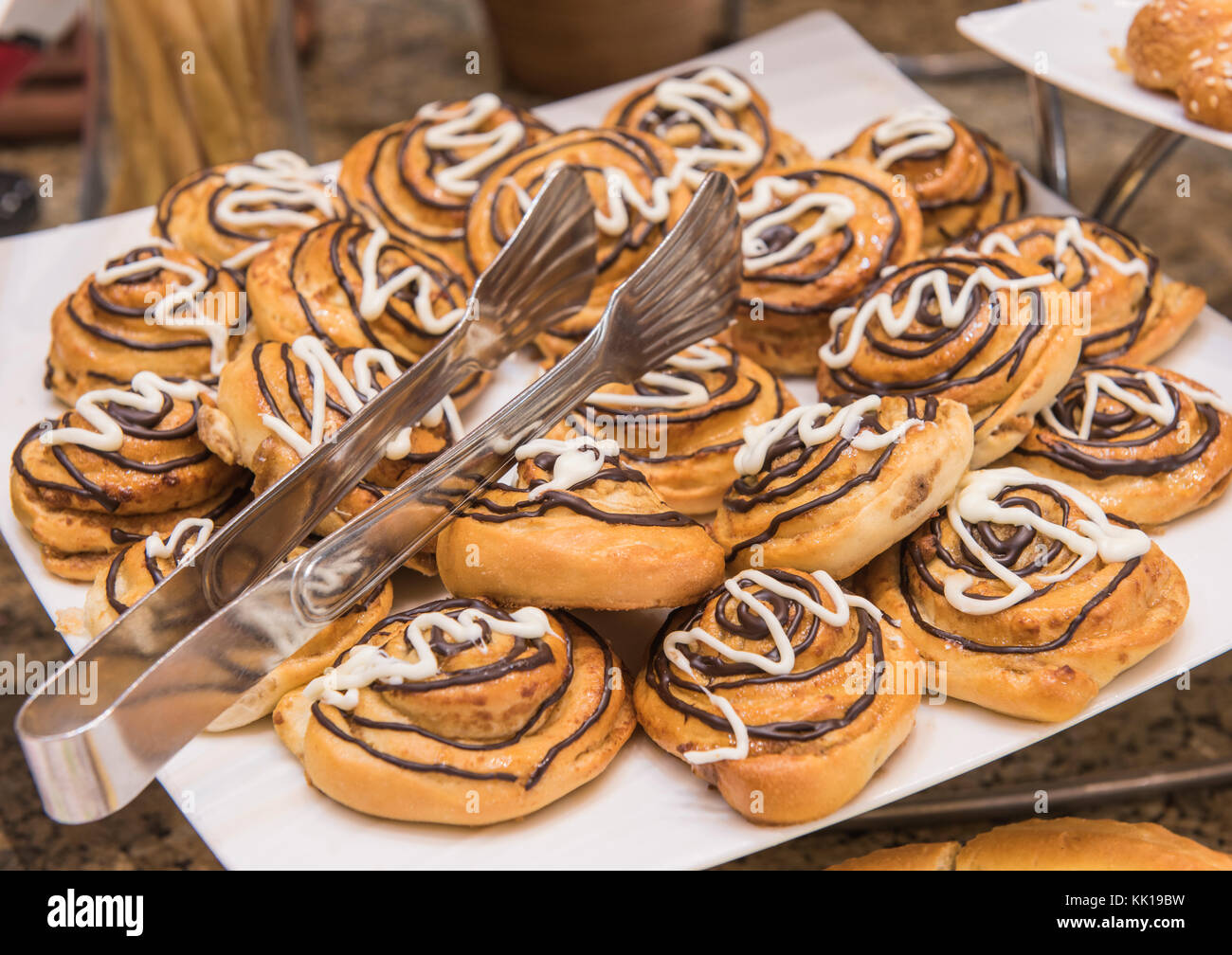 Selection display of sweet pastry food at a luxury restaurant buffet ...